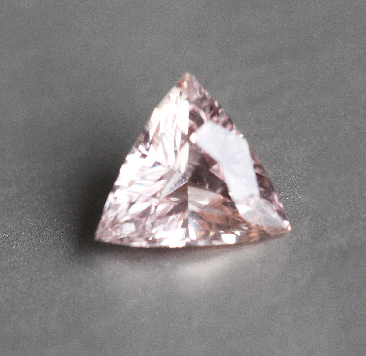 Loose 0.75 ct Triangle Peach Pink Sapphire | Capucinne